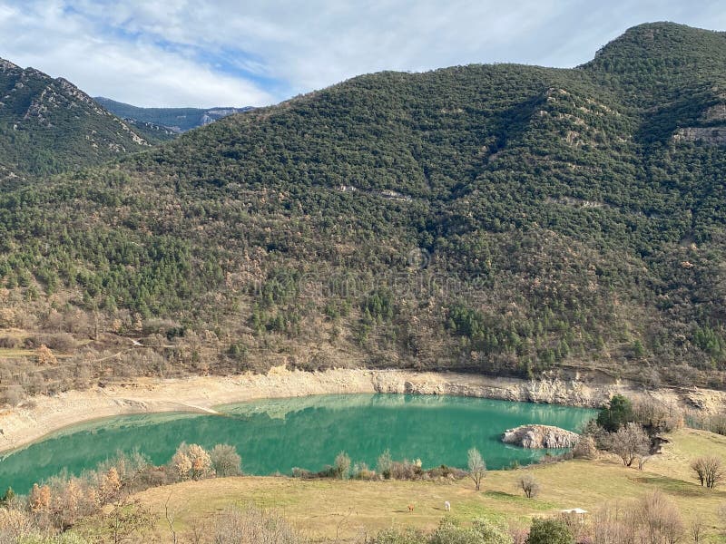 Clean, Pure Lake Surrounded by Hills and Dense Forests Stock Photo ...