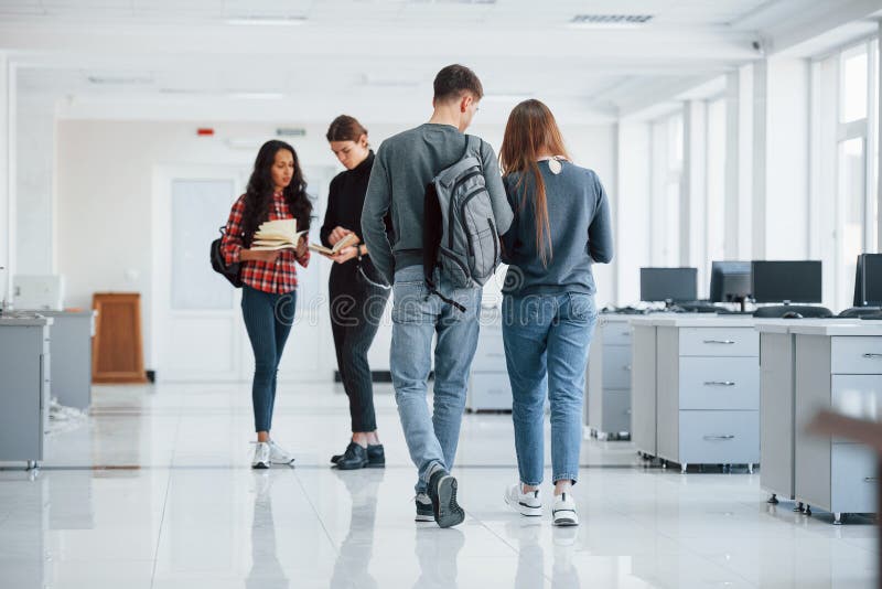 Clean Room. Group of Young People Walking in the Office at Their Break ...