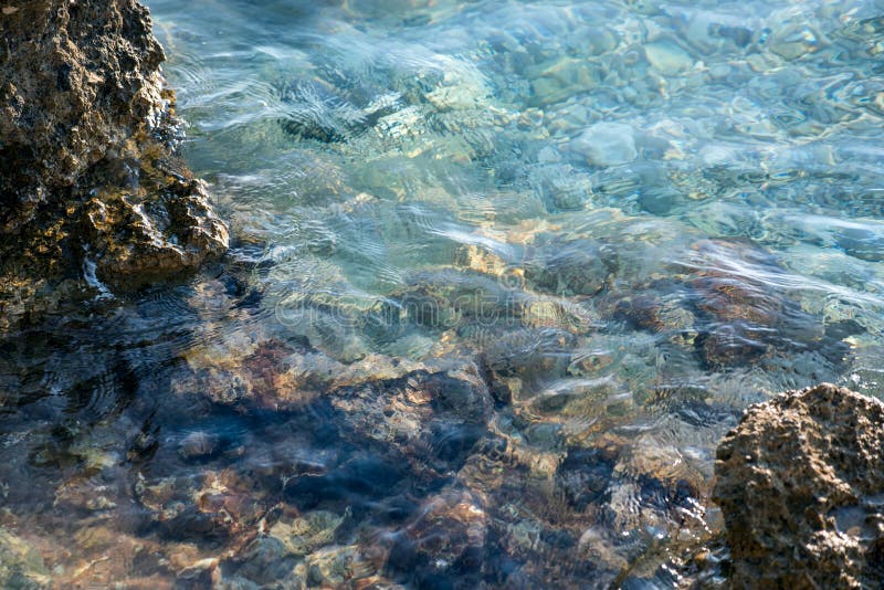 Clean Sea Water at the Rocky Beach Stock Photo - Image of coast, ocean ...