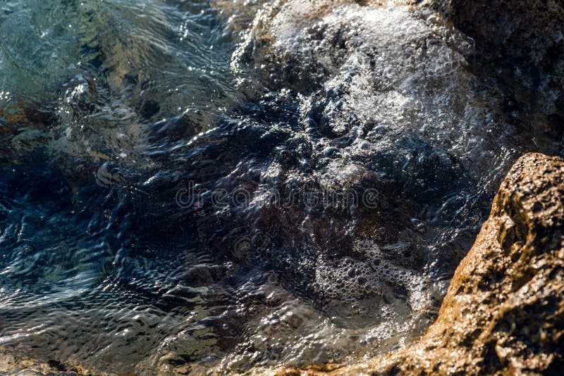 Clean Sea Water at the Rocky Beach Stock Image - Image of bright, color ...