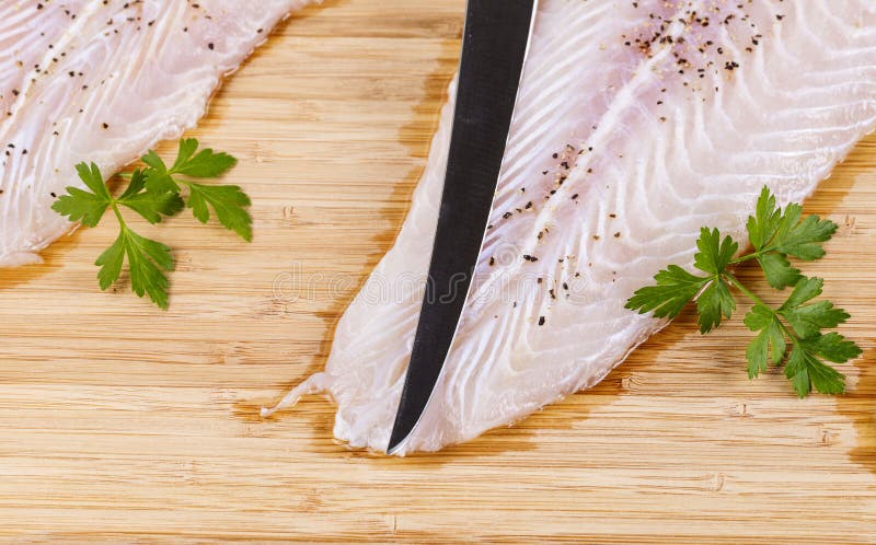 Clean and Seasoned Fish Fillets with Sharp Knife Stock Photo - Image of ...