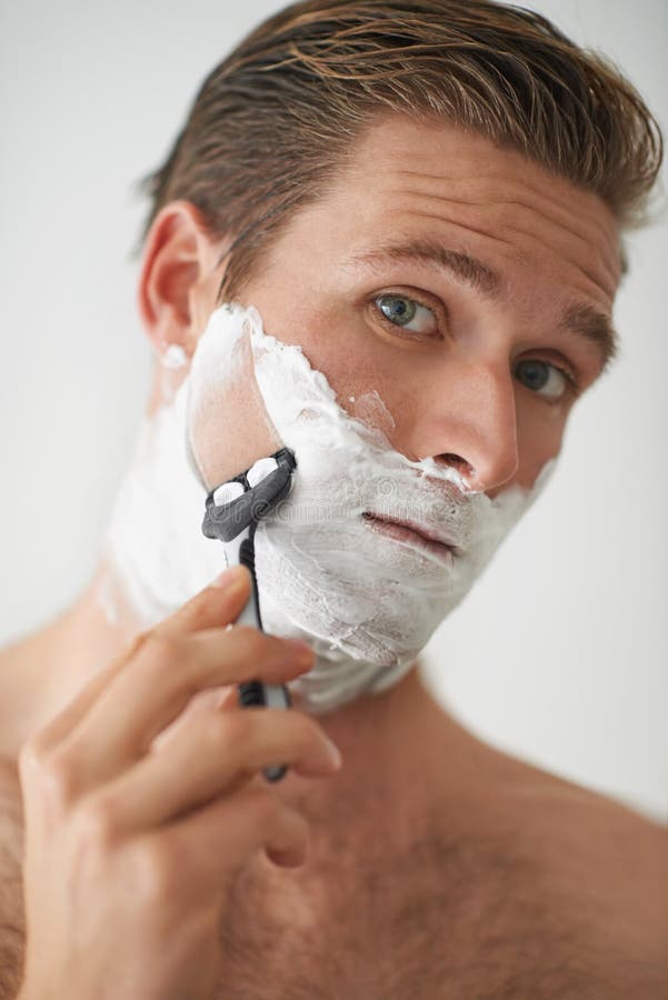 Clean Shaven is Best. a Handsome Young Man Shaving. Stock Image - Image ...