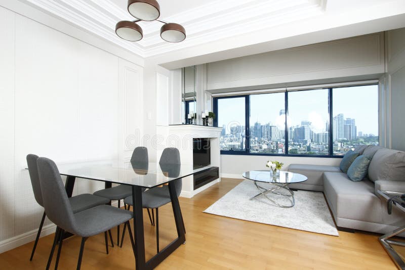 Clean and Simple Dining Table with Lighting Fixture in a Modern ...