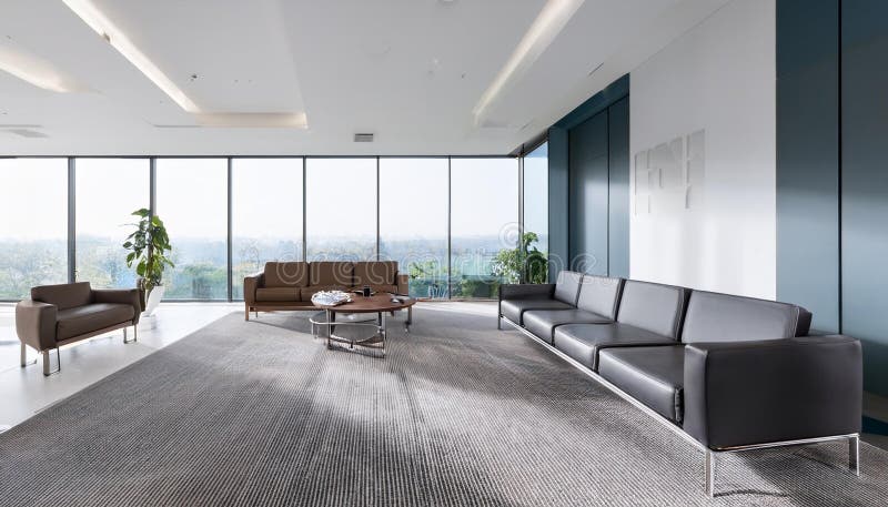 Clean Spacious Waiting Area with Couches and Coffee Table in Modern ...