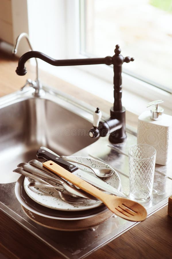 Clean Stack of Dishes on the Kitchen Sink Stock Image - Image of ...