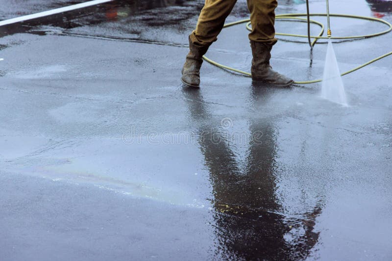 Clean a Street Sprayed with Pressurized Water, Wet Washing Cleaning ...