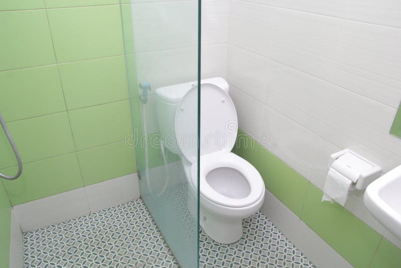 Clean Toilet with Glass Partition Stock Image - Image of toilet, paper ...