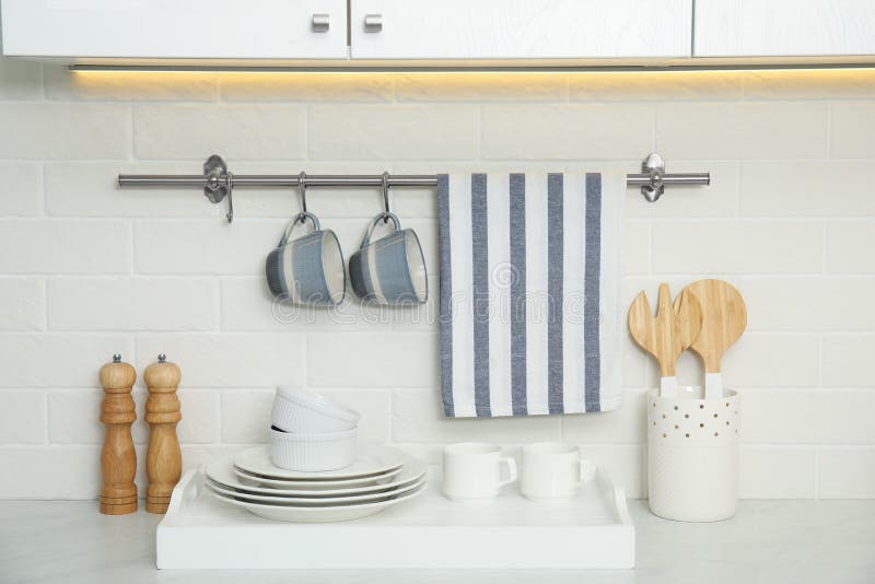 Clean Towel, Utensils and Dishware in Kitchen Stock Image - Image of ...