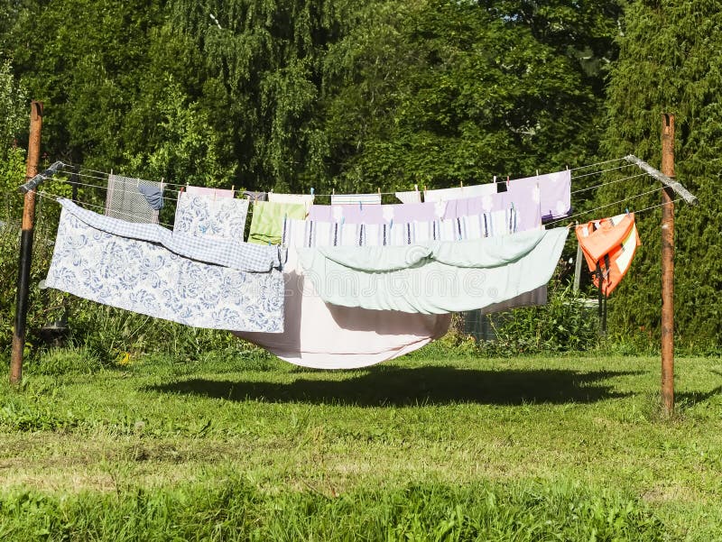 Clean Washed Laundry Hanging on the Rope Outdoors Stock Photo - Image ...