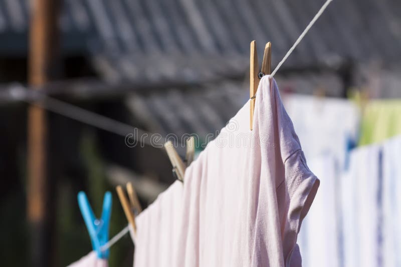 Clean Washed Laundry Hanging on the Rope Outdoors Stock Image - Image ...