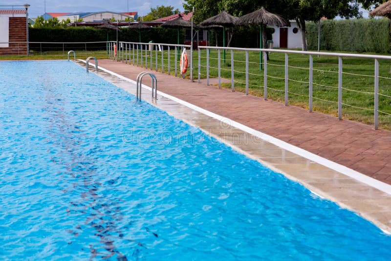 Clean water in a blue pool stock image. Image of chlorine - 162559349