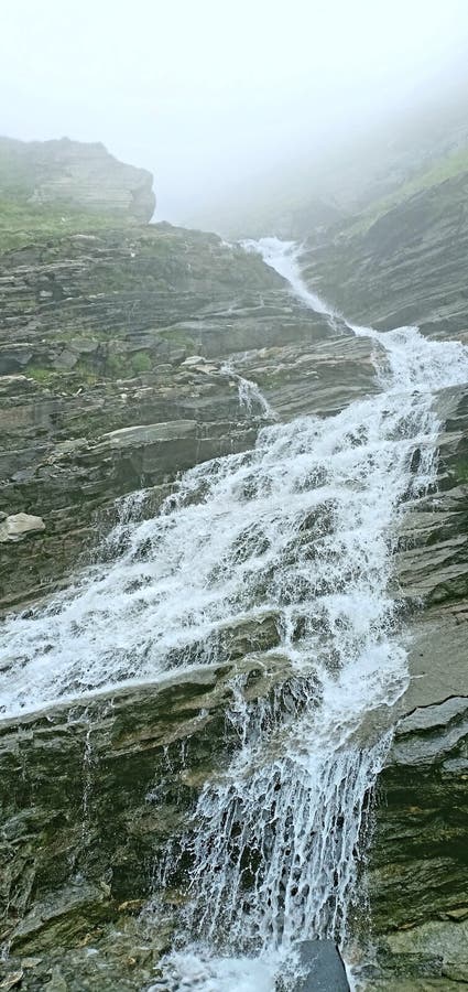 Clean Water Falling from the Mountain Making Waterfall Stock Image ...