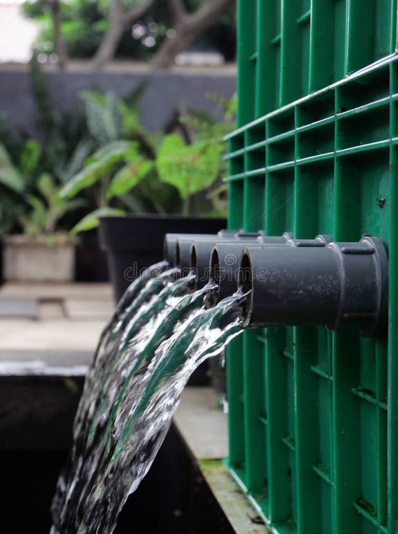 Clean Water Flows in a Pipe after Being Filtered in a Fish Pond Stock ...