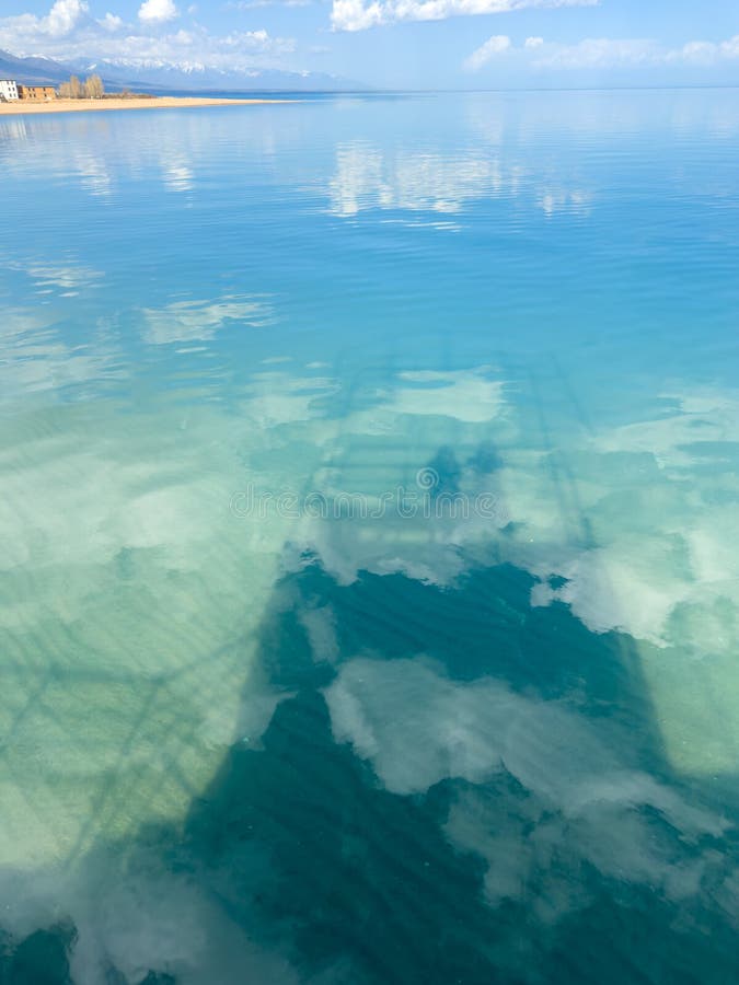 Clean Water at Sea. Reflection of Clouds and Bottom in the Water. Stock ...
