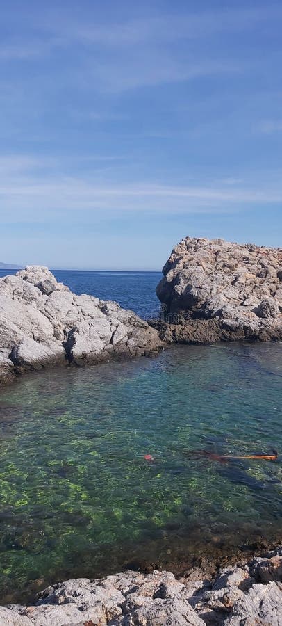 Clean water sea and rocks stock photo. Image of soil - 271444966