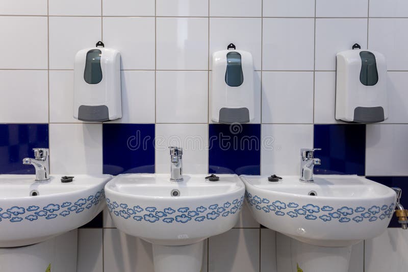 Clean, Wellmaintained Public Restrooms with Modern Sanitation Tools and ...