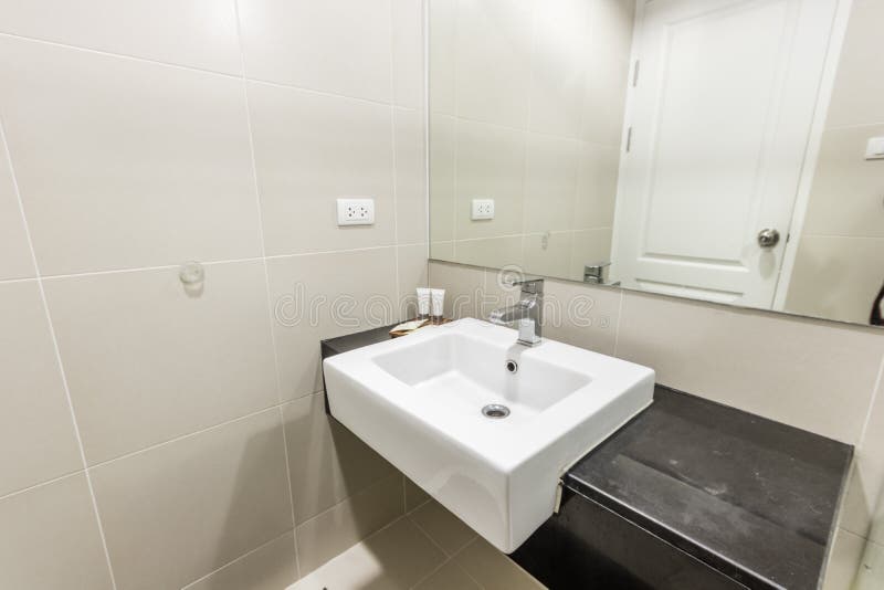 Clean and White Bathroom with Amenities Stock Image - Image of hotel ...