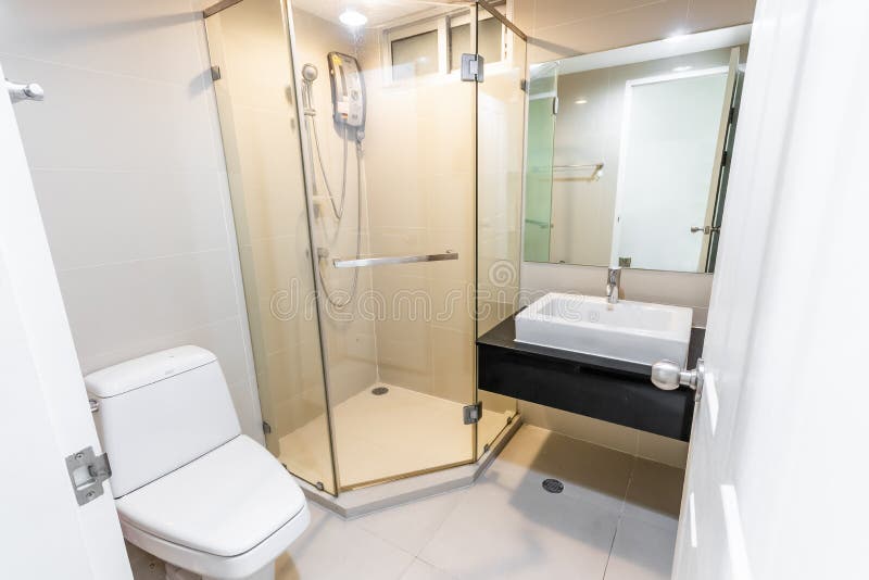 Clean and White Bathroom with Amenities Stock Image - Image of care ...