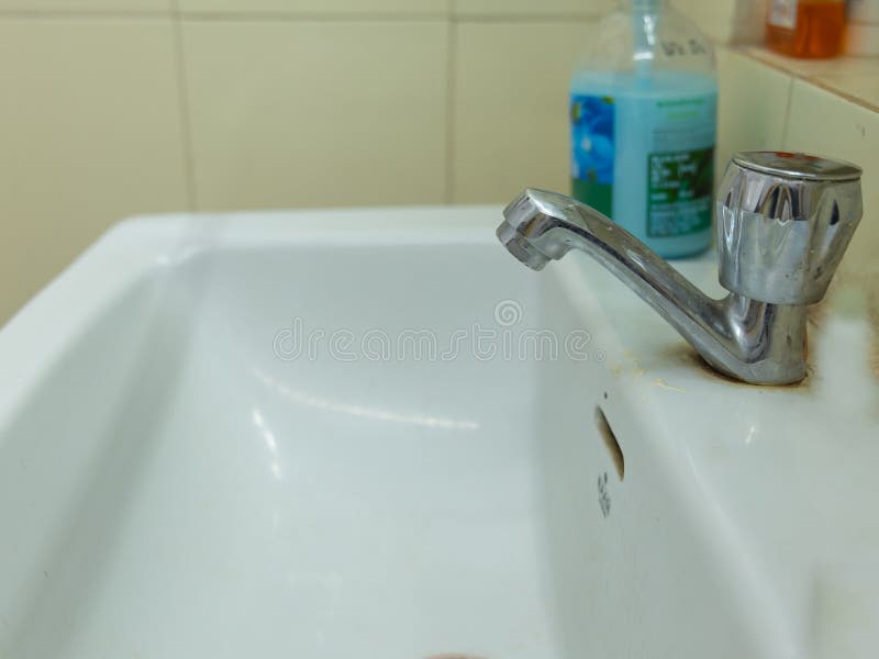 A Clean White Ceramic Wash Basin with Liquid Soap Stock Photo - Image ...