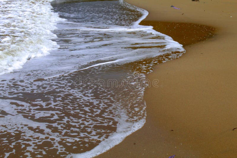 Sand on the Beach and Bubbly Waves Stock Image - Image of sand, white ...