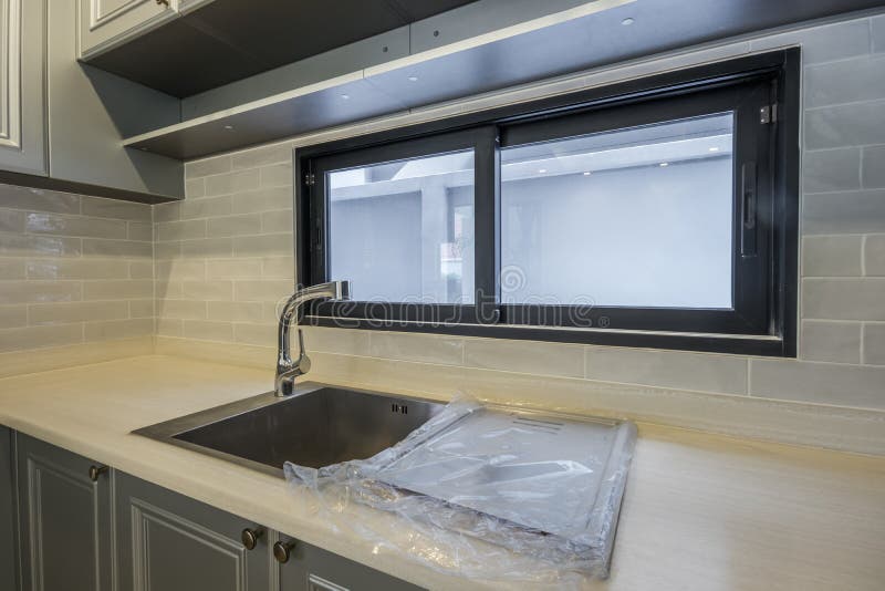 A Clean White Kitchen Corner in the Condo Stock Image - Image of clean ...