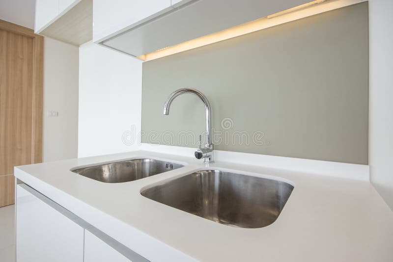 A Clean White Kitchen Corner in the Condo Stock Photo - Image of ...