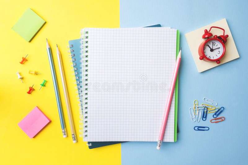 Clean White Notebook and Pencil with Copy Space on Yellow Blue Table ...