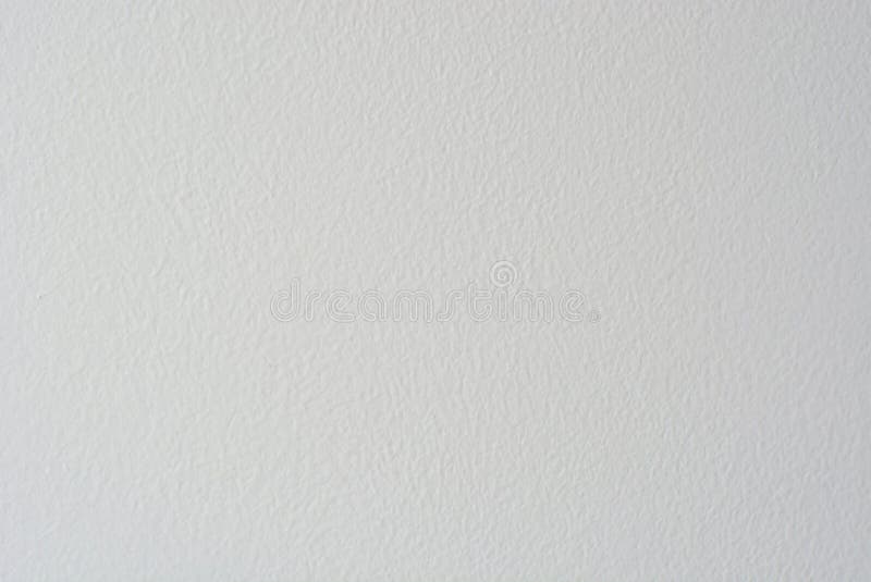 White Textured Wall with Subtle Variations in Light Across a Smooth ...