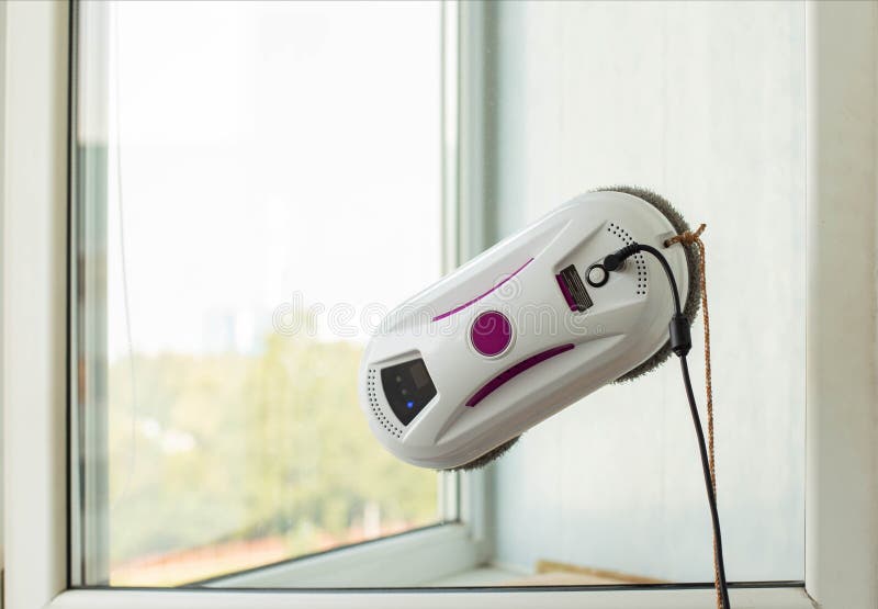 Clean Windows Safely with a Window Cleaning Robot, Close-up Stock Photo ...