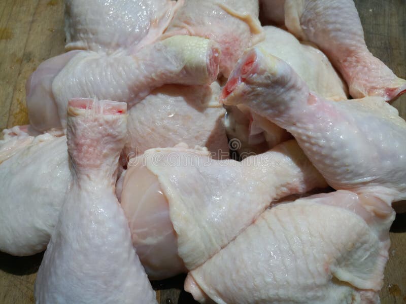 Raw Chicken Pieces on a Wooden Surface Stock Photo - Image of pieces ...