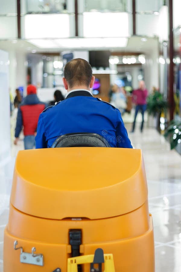 Cleaner at the Sweeper in the Mall Editorial Image - Image of clean ...