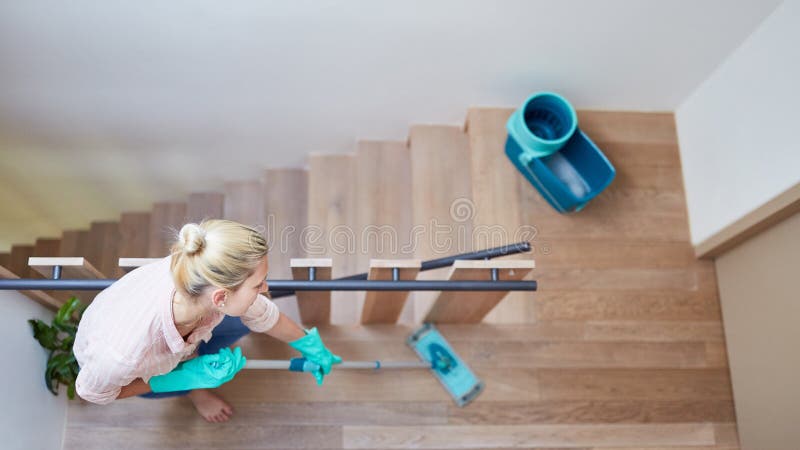 Cleaning Lady with Mop while in the Stairwell Stock Photo - Image of ...