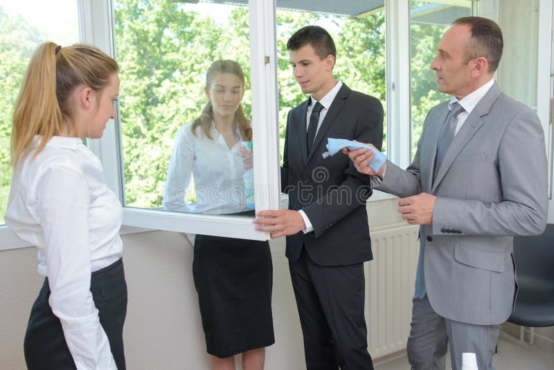 Cleaner Team in Uniform Working at Hotel with Manager Stock Image ...