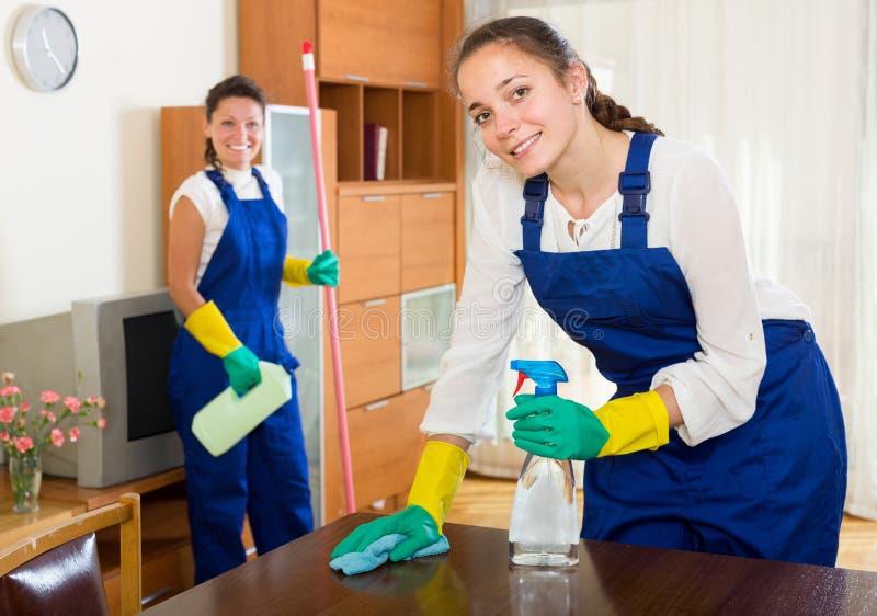 Cleaners cleaning in room stock image. Image of premises - 62420413