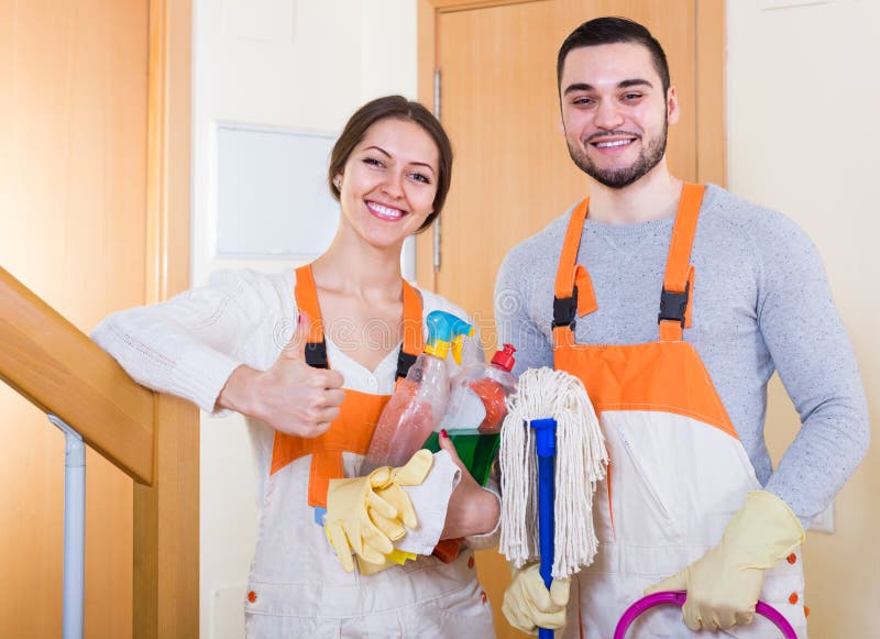 Cleaners cleaning in room stock photo. Image of maid - 54819076