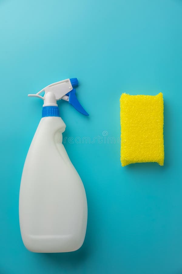 Cleaning Agent in a White Bottle with a Sponge on a Blue Background ...