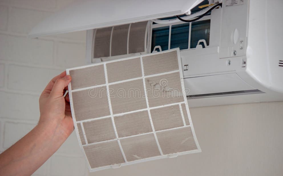 Cleaning Air Conditioner Filter for Better Air Quality Stock Photo ...