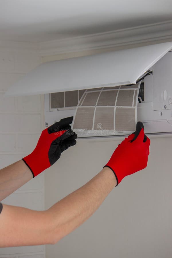 Cleaning Air Conditioner Filter for Better Air Quality Stock Photo ...