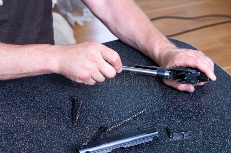 Cleaning the Barrel of the Pistol. Weapon Care Stock Image - Image of ...
