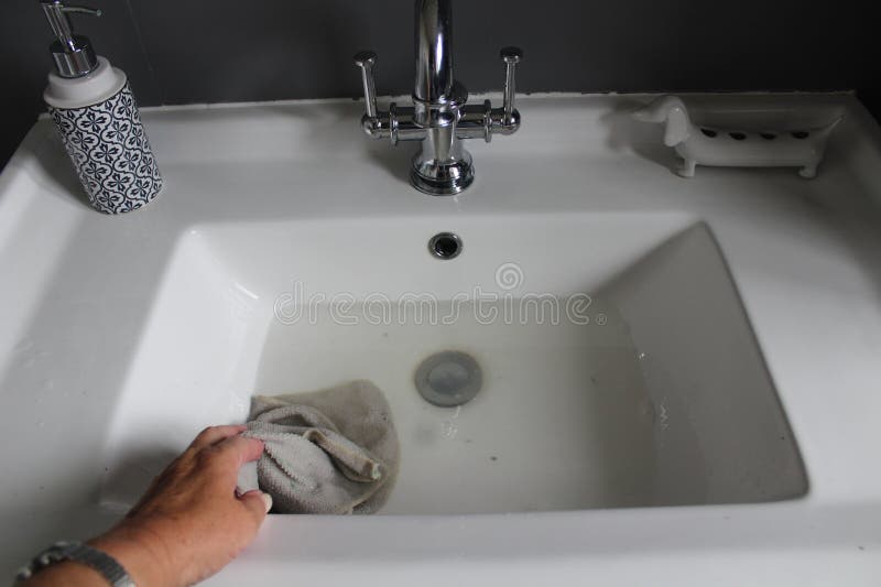 Cleaning the Bathroom Sink Chore Stock Photo - Image of room, cleaning ...