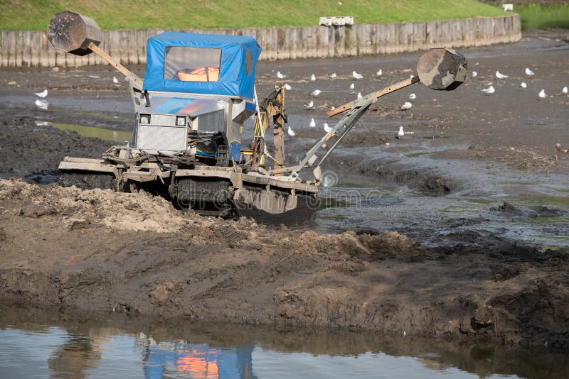 Cleaning the Bottom of the Lake with a Dredge Stock Photo - Image of ...