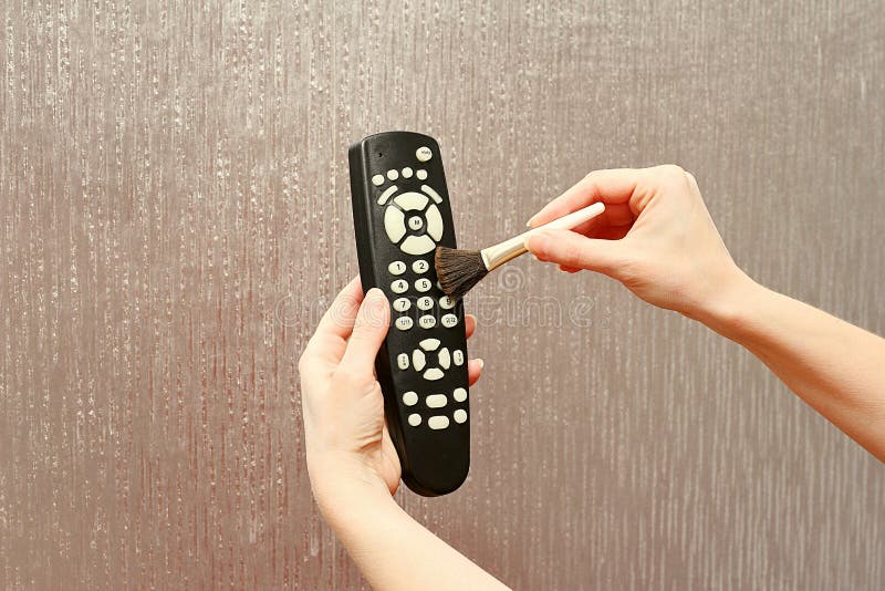 Cleaning Brush Dust Remote Control. Stock Photo - Image of dust, hands ...