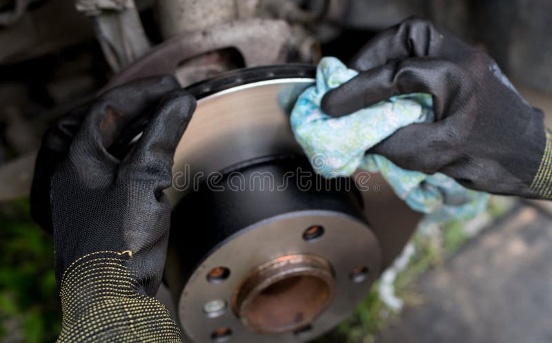 Cleaning of car disc. stock image. Image of corrosion - 189711109