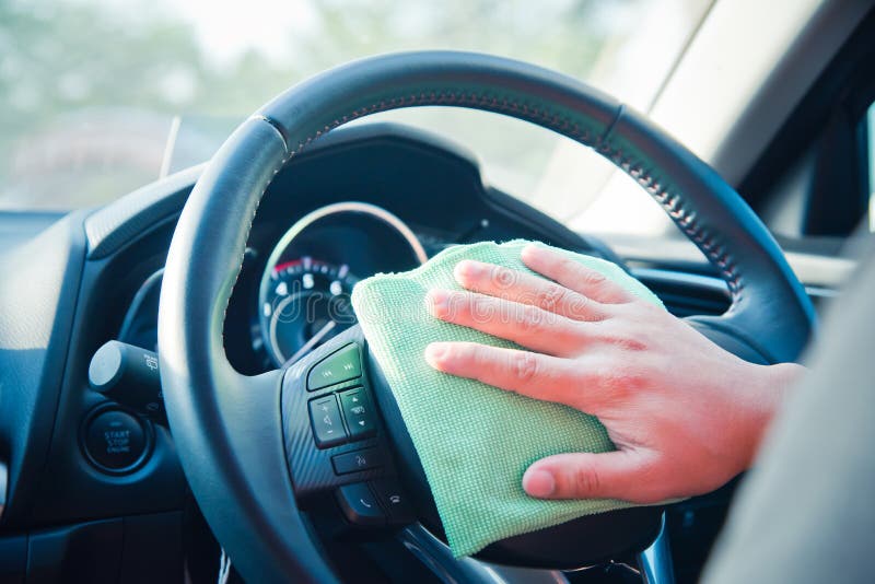Cleaning the Car Interior with Green Microfiber Cloth Stock Photo ...