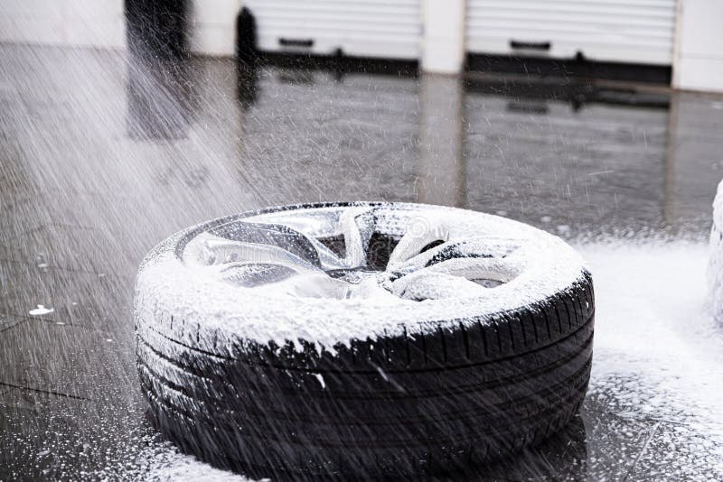 Cleaning Car Wheel and Tire with Active Foam Stock Photo - Image of ...