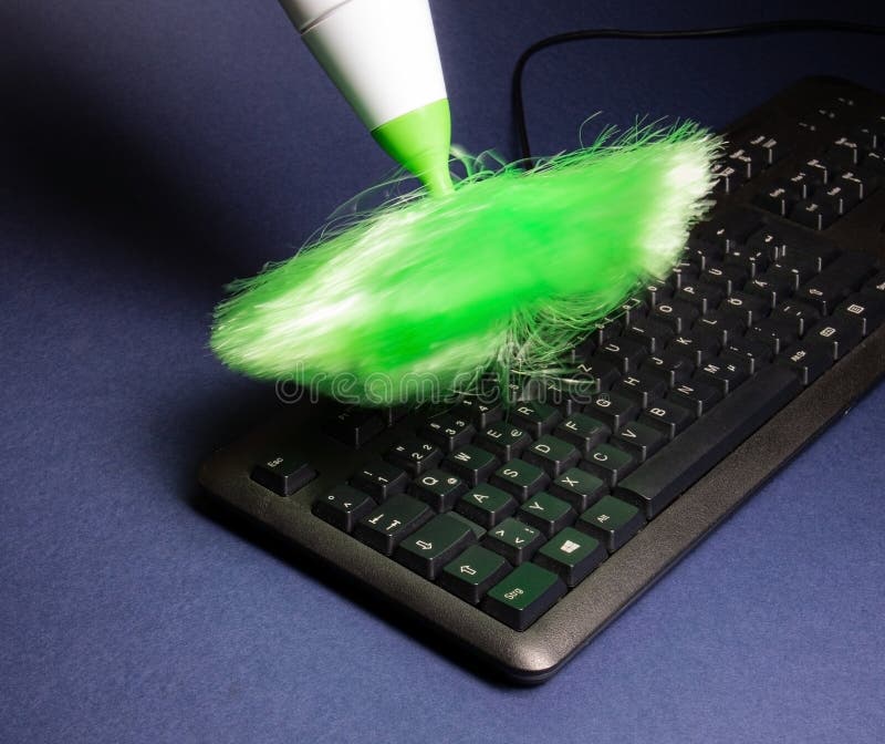 Cleaning a Computer Keyboard from Dust with an Electric Brush Stock ...