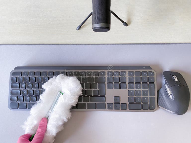 Cleaning Computer Keyboard with Duster and Microphone Stock Photo ...