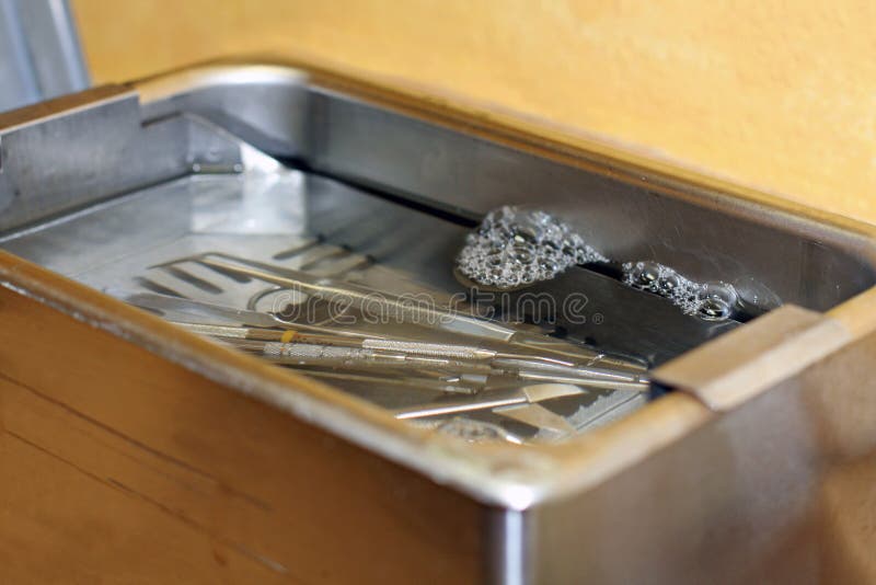 Cleaning Dental Instruments Stock Image - Image of oral, health: 6856753
