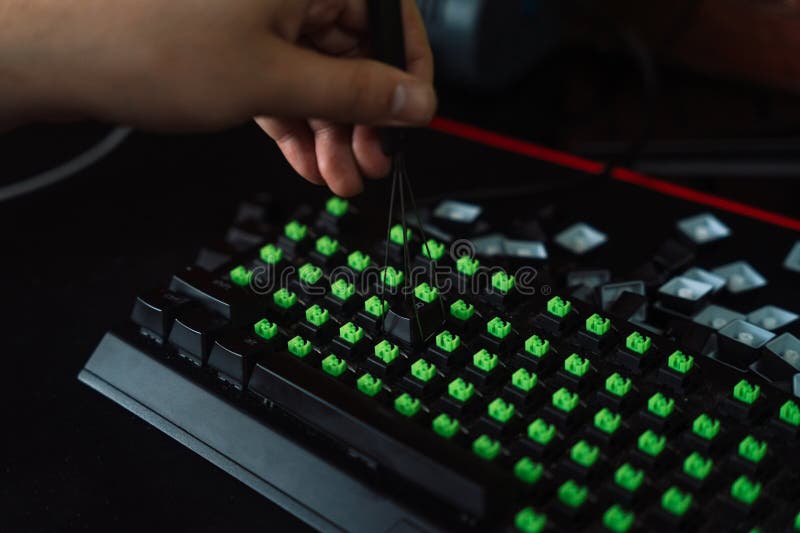 Cleaning and Disassembling the Keyboard. Removing Keycaps Using a Cap ...
