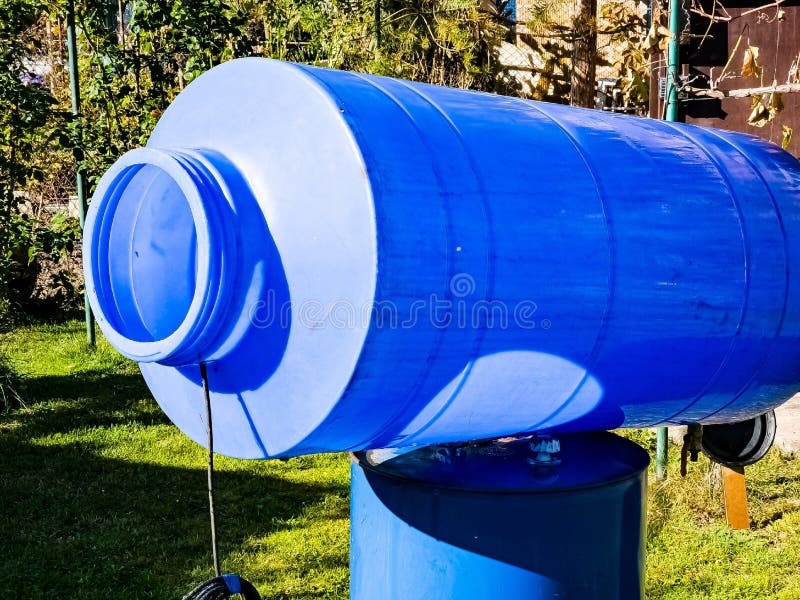 Cleaning of Drinking Water Container. a Blue Plastic Container for ...